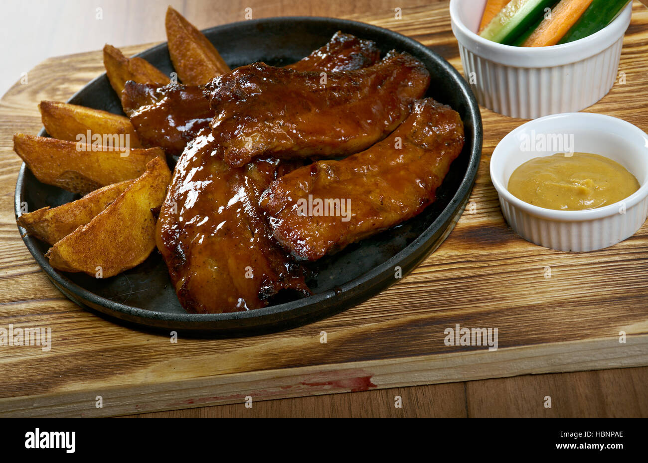 Grilled caramelized pork ribs Stock Photo - Alamy