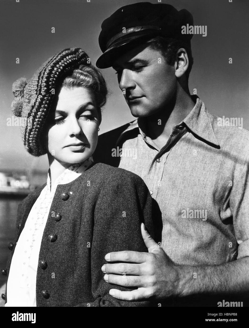 EDGE OF DARKNESS, from left: Ann Sheridan, Errol Flynn, 1943 Stock ...