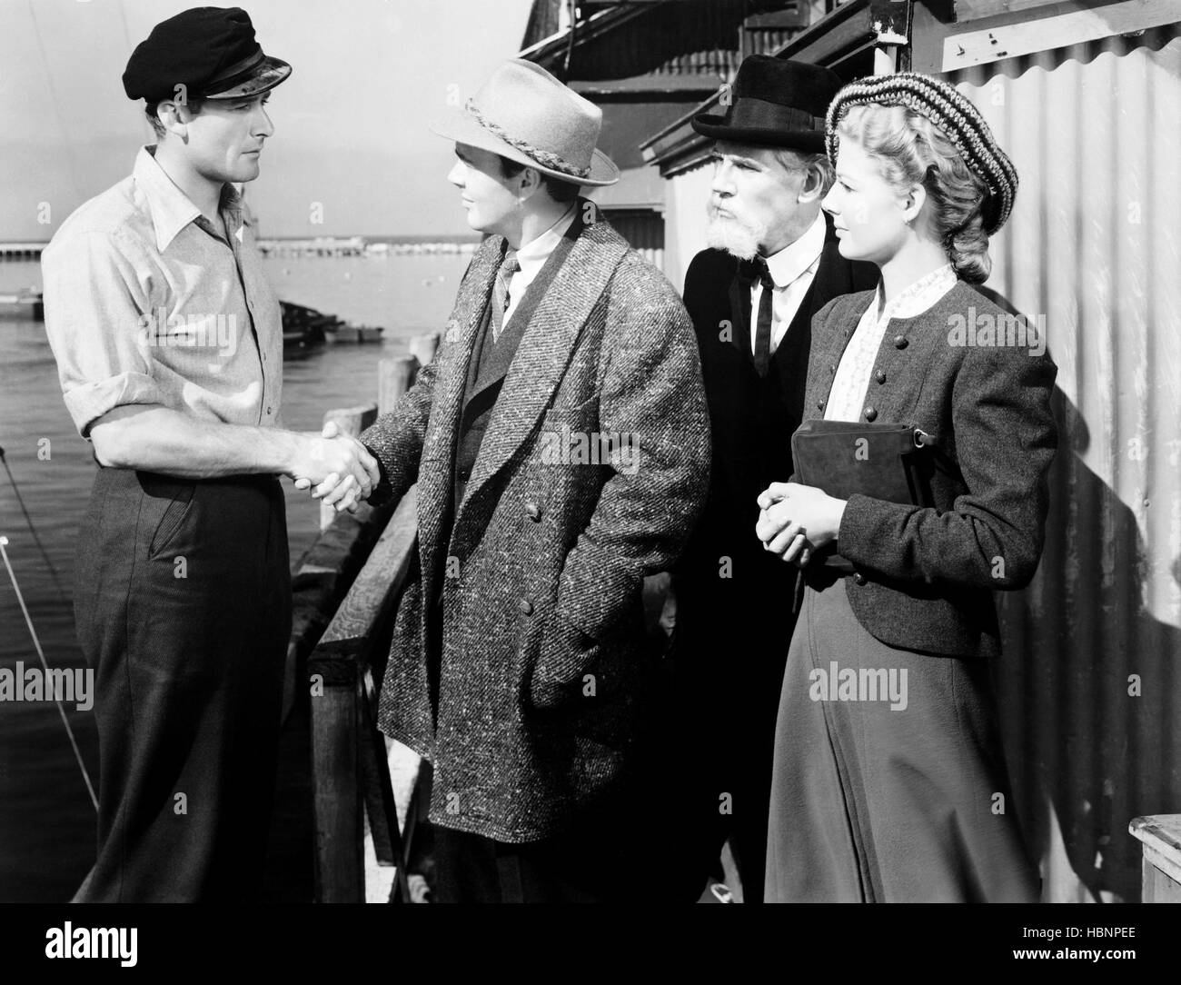 EDGE OF DARKNESS, from left: Errol Flynn, John Beal, Walter Huston, Ann ...