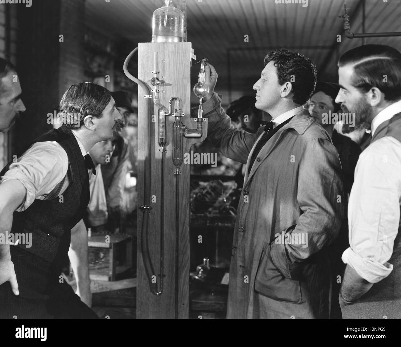 EDISON, THE MAN, from left: Felix Bressart, Spencer Tracy, Peter Godfrey, 1940 Stock Photo - Alamy