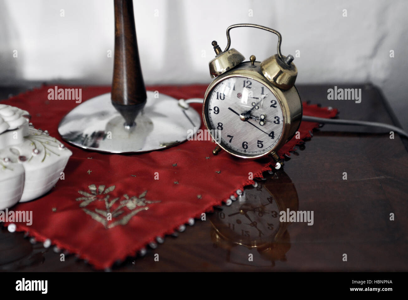 Old fashion table and table clock Stock Photo - Alamy