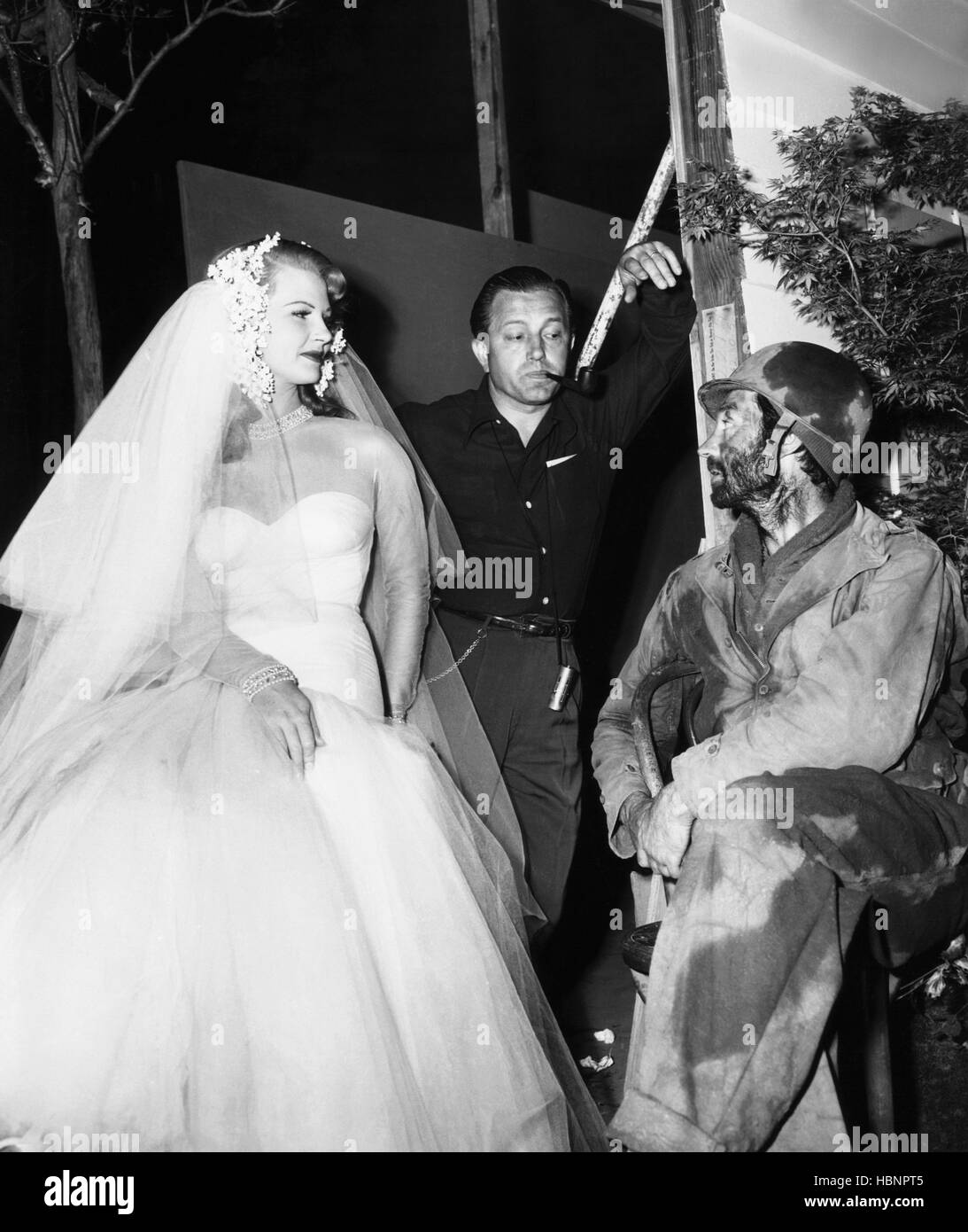 EIGHT IRON MEN, from left: Mary Castle, director Edward Dmytryk, James ...