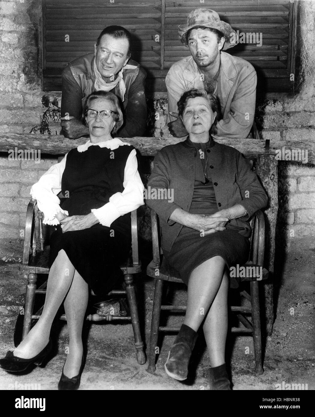 John Wayne, Robert Mitchum on the set of EL DORADO, 1966 Stock Photo ...