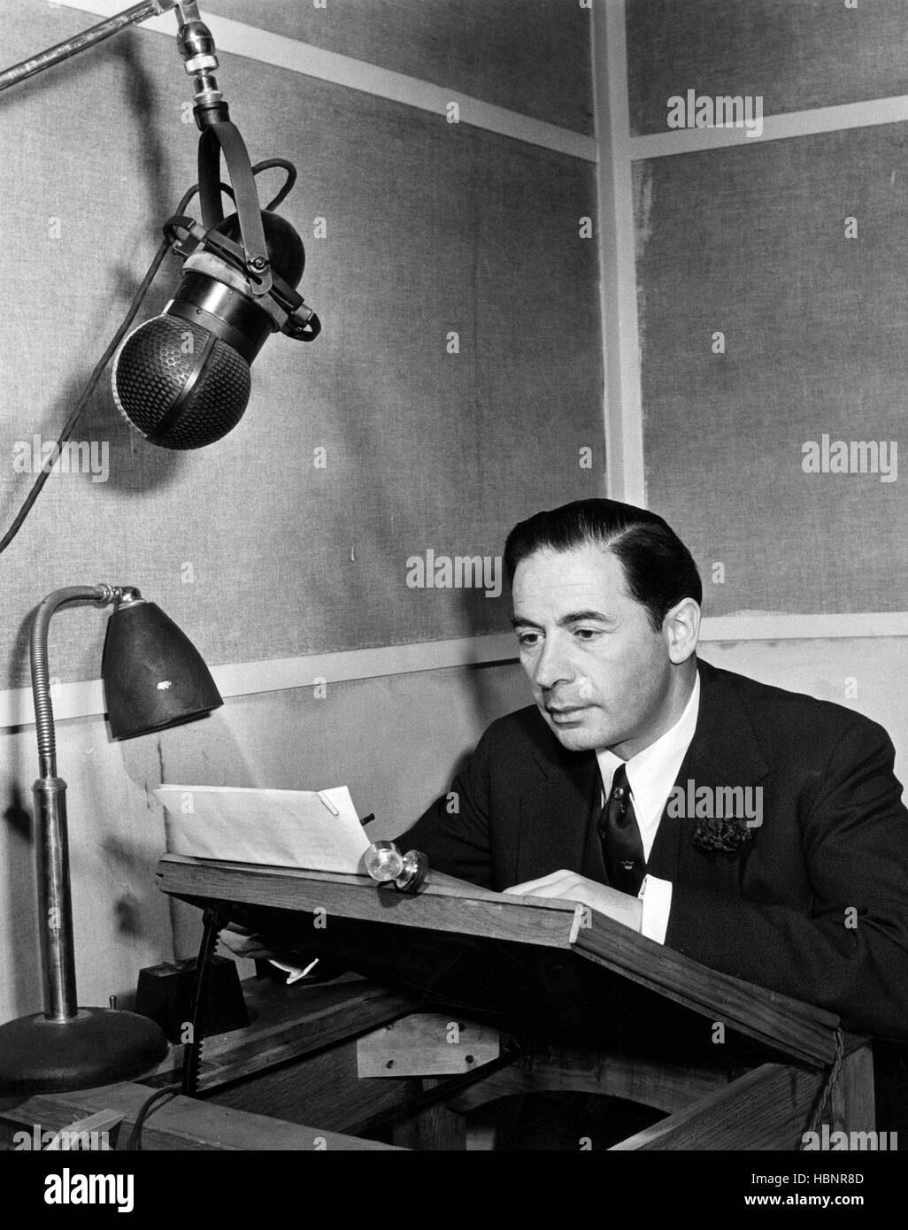 ELIZABETH IS QUEEN, Leo Genn in studio narrating the film, 1953 Stock ...