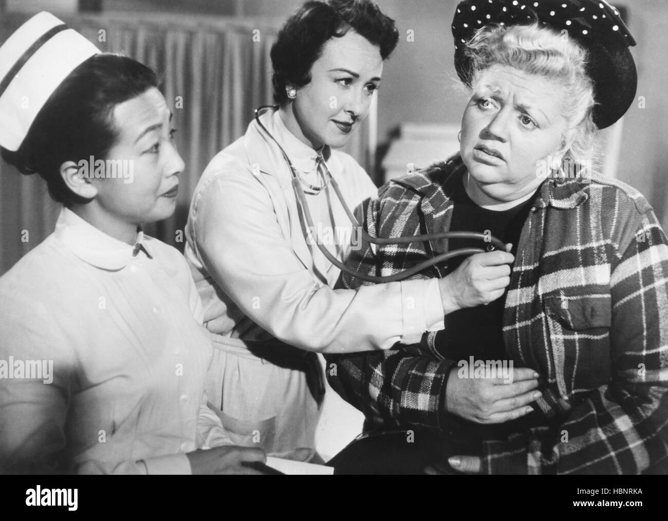 Medical examination 1950s Black and White Stock Photos & Images - Alamy