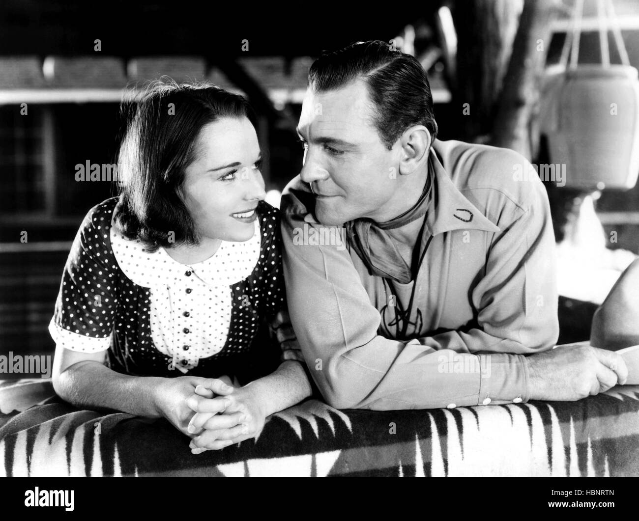 EMPTY SADDLES, from left, Louise Brooks, Buck Jones, 1936 Stock Photo ...