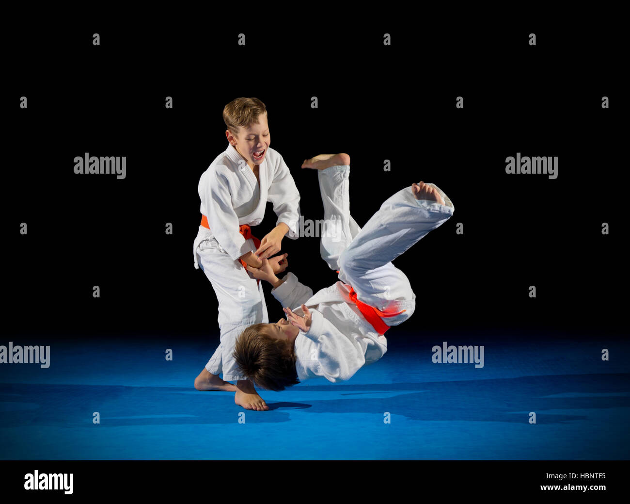 Little boys martial arts fighters isolated Stock Photo - Alamy
