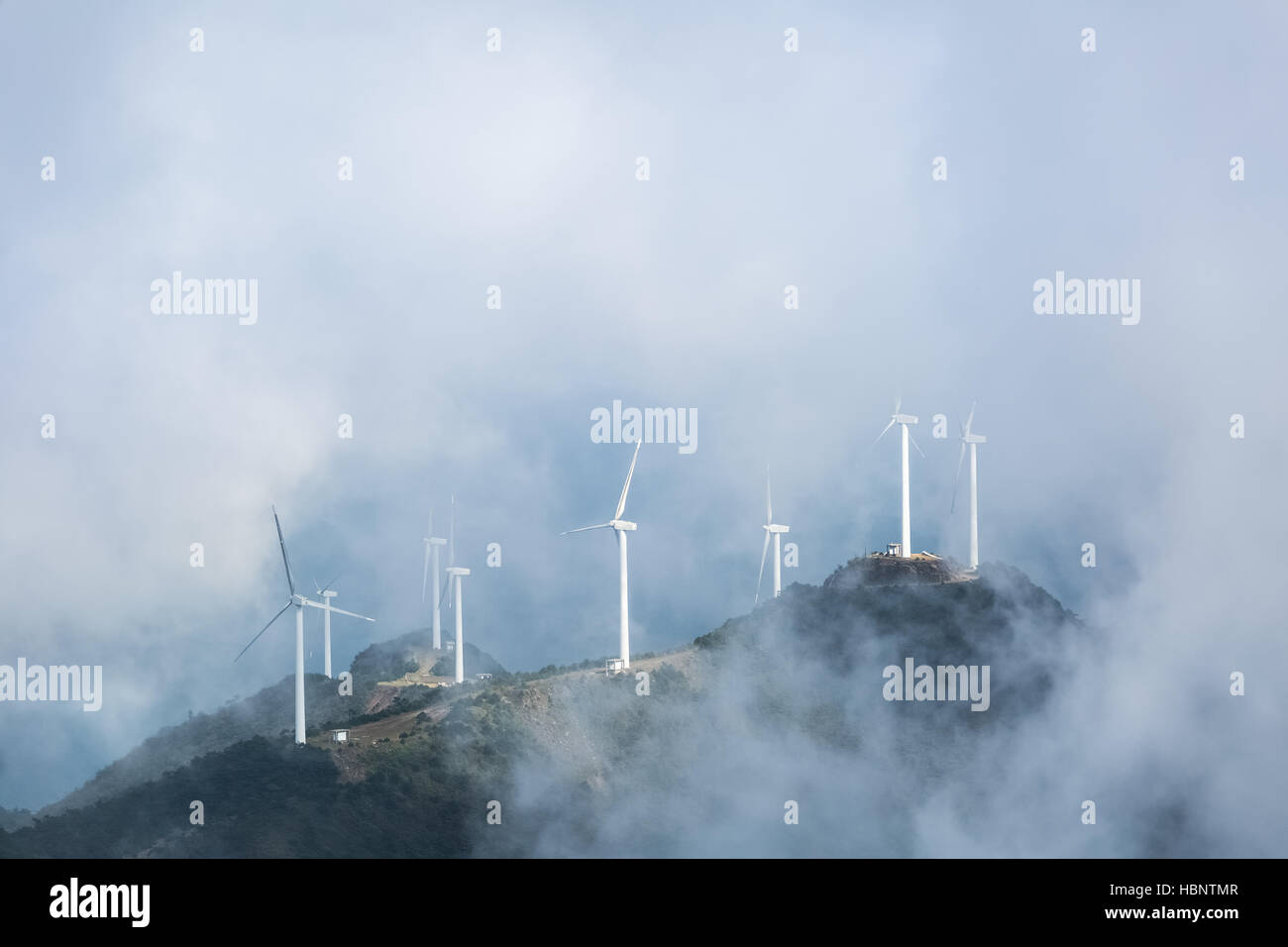 wind farms in the misty clouds Stock Photo - Alamy