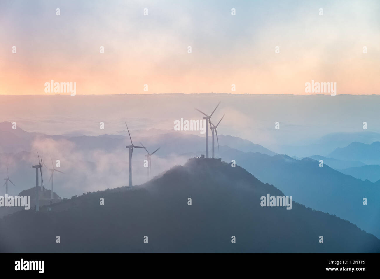 wind farm in sunrise Stock Photo - Alamy