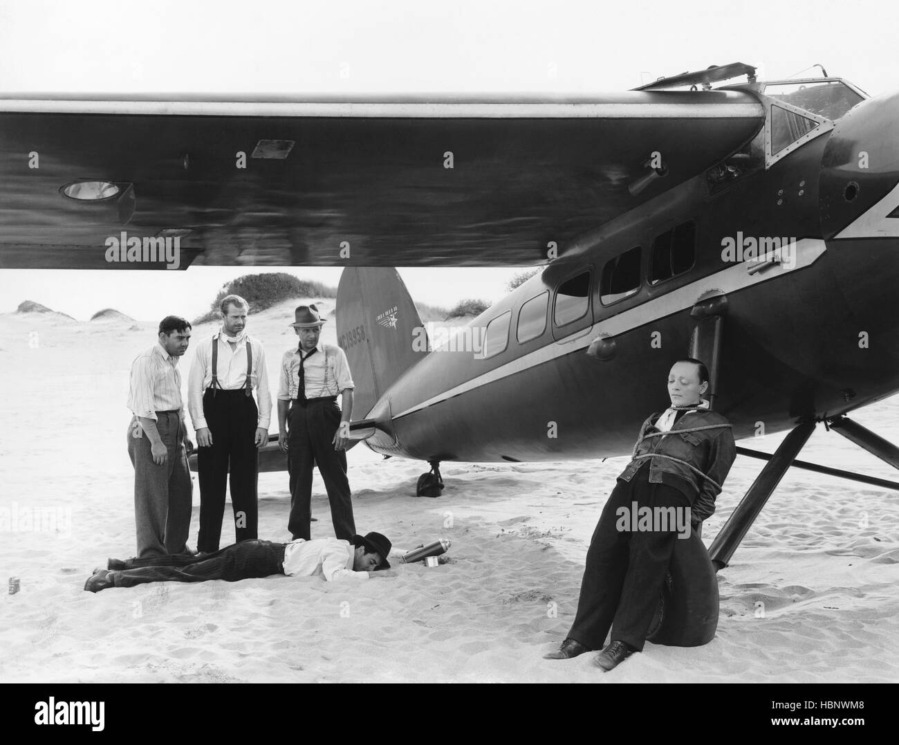 THE FACE BEHIND THE MASK, standing from left: Cy Schindell, James Seay ...