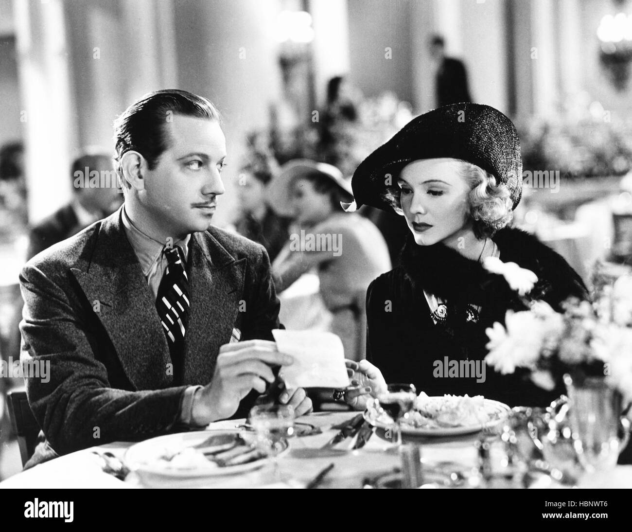 FAST COMPANY, from left, Melvyn Douglas, Claire Dodd, 1938 Stock Photo ...