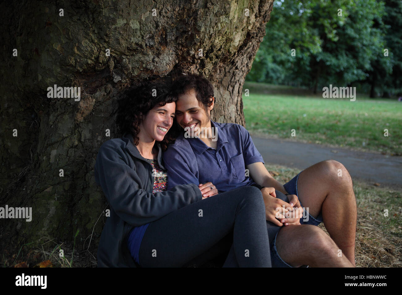 Woman lean against man hi-res stock photography and images - Alamy