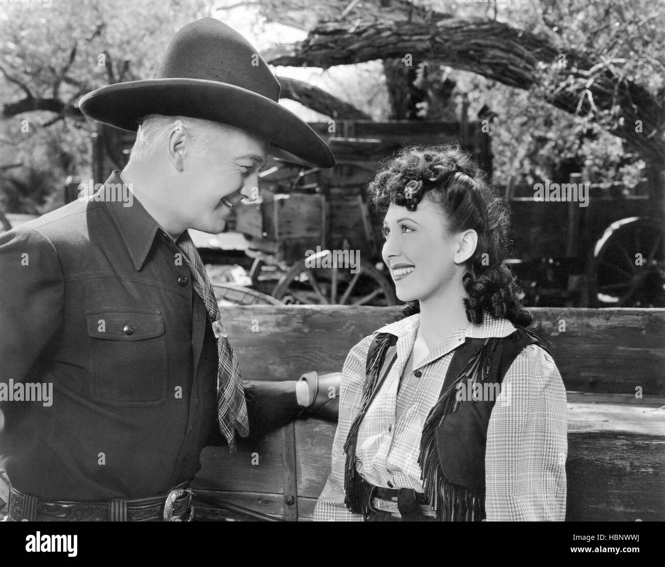 FALSE COLORS, from left: William Boyd, Claudia Drake, 1943 Stock Photo ...