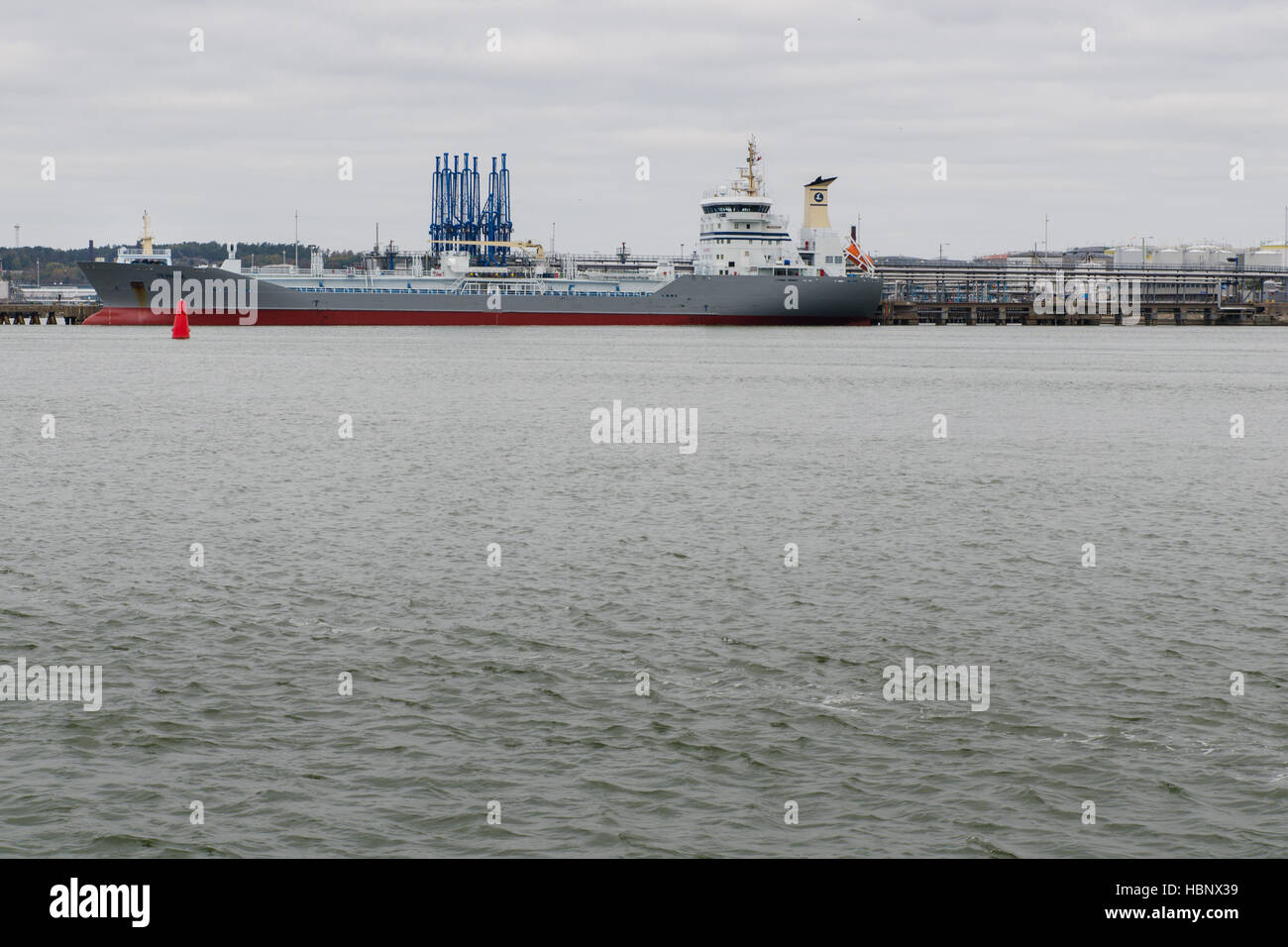 one big ship in Gothenburg harbour loiding the ship with oil Stock ...