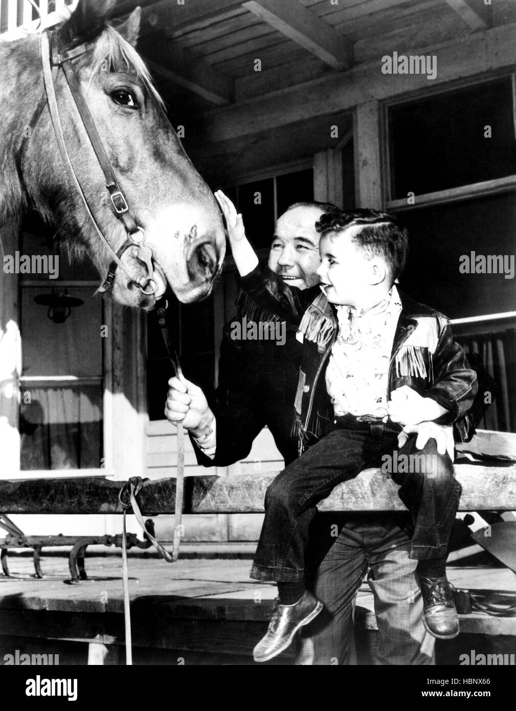 THE FASTEST GUN ALIVE, back to front: Broderick Crawford with son ...