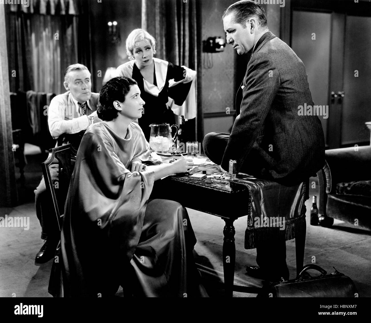 THE FALSE MADONNA, front from left: Kay Francis, William 'Stage' Boyd ...