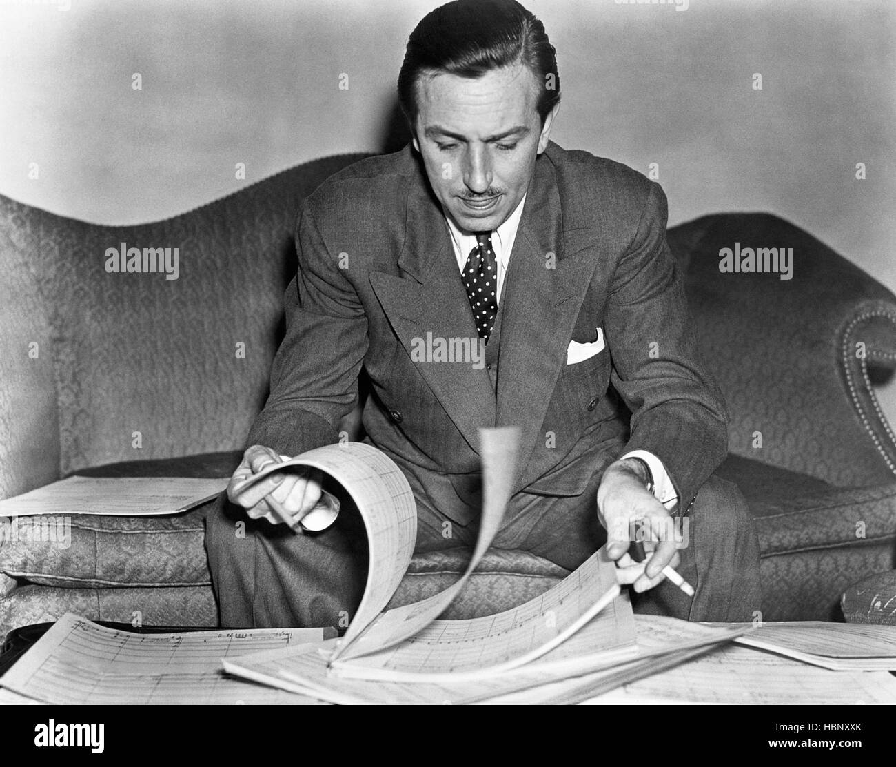 FANTASIA, producer Walt Disney studying the music score, 1940 Stock ...