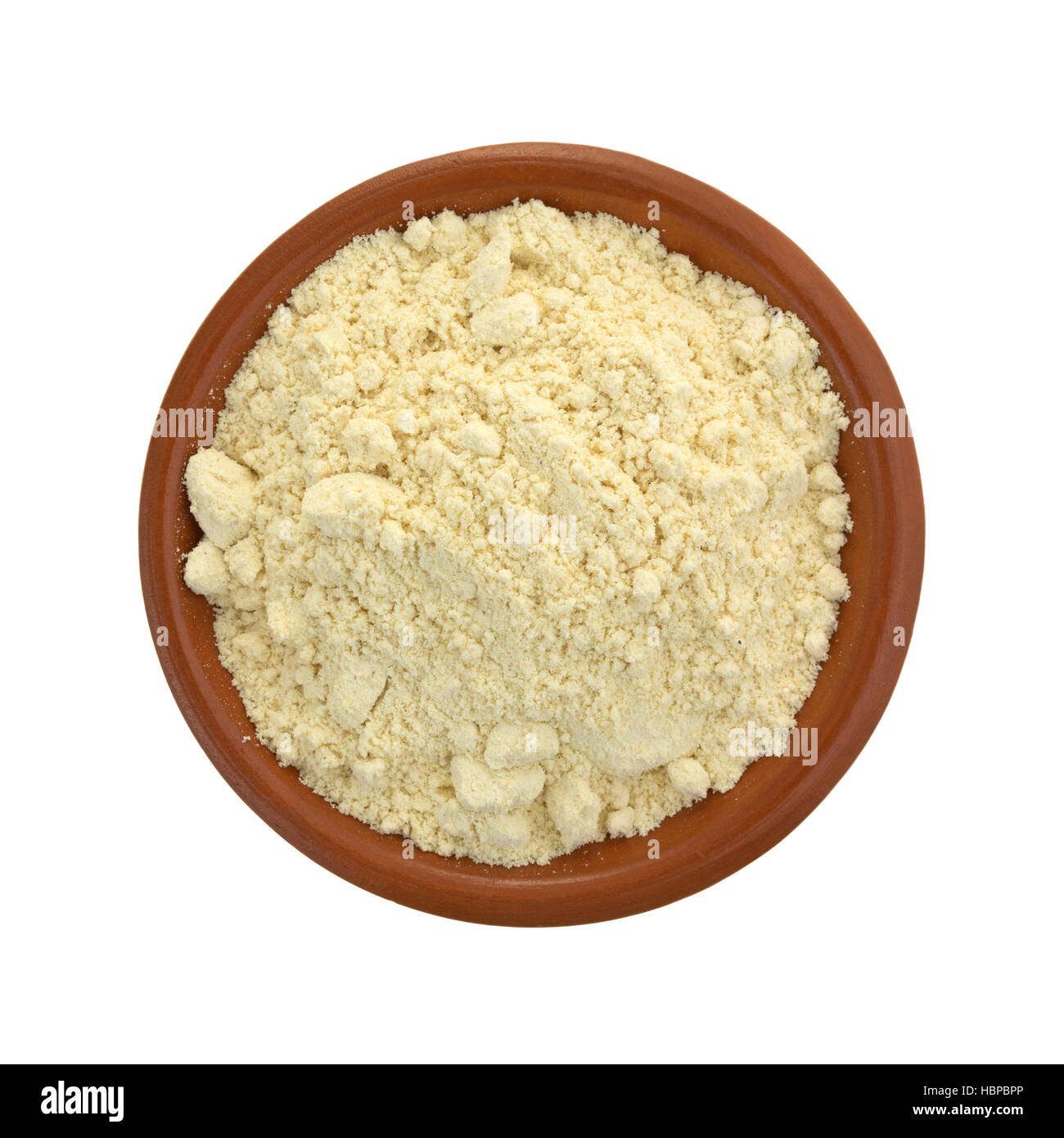 Top view of a small bowl filled with ground soy powder isolated on a ...
