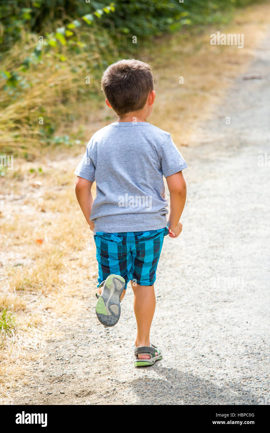 Child road run hi-res stock photography and images - Alamy