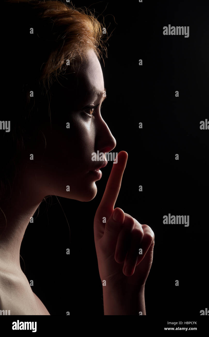 Quiet finger profile hi-res stock photography and images - Alamy