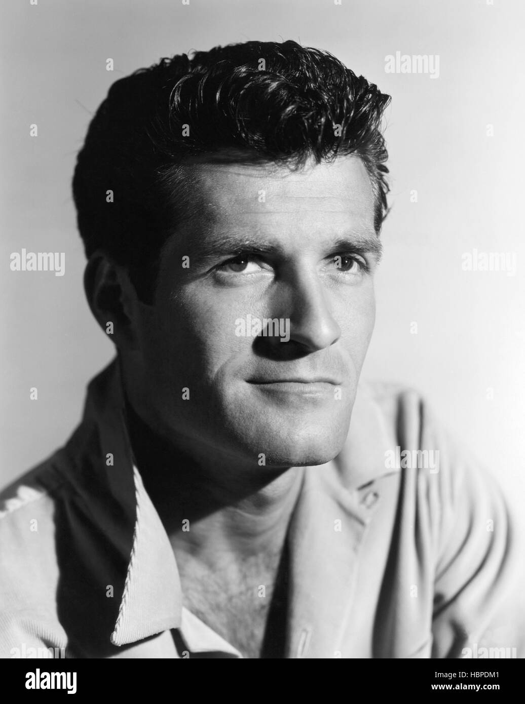 DRUMS ACROSS THE RIVER, Hugh O'Brian, 1954 Stock Photo - Alamy