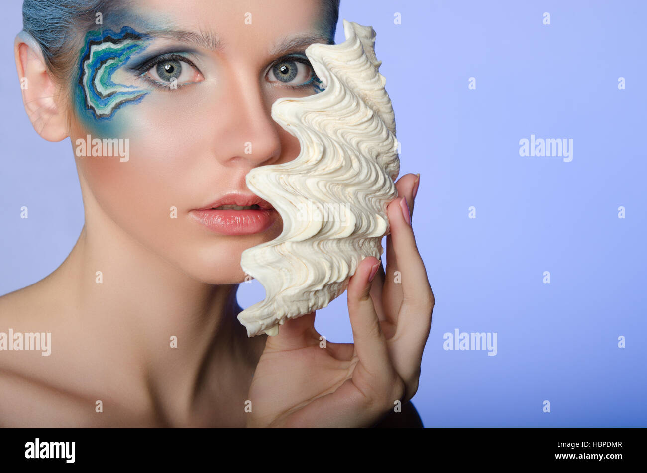 woman in make mermaid with seashell Stock Photo - Alamy