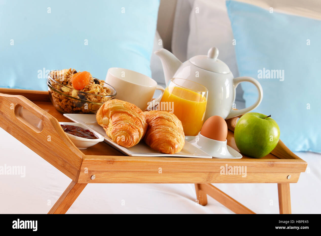 Breakfast on tray in bed in hotel room Stock Photo - Alamy