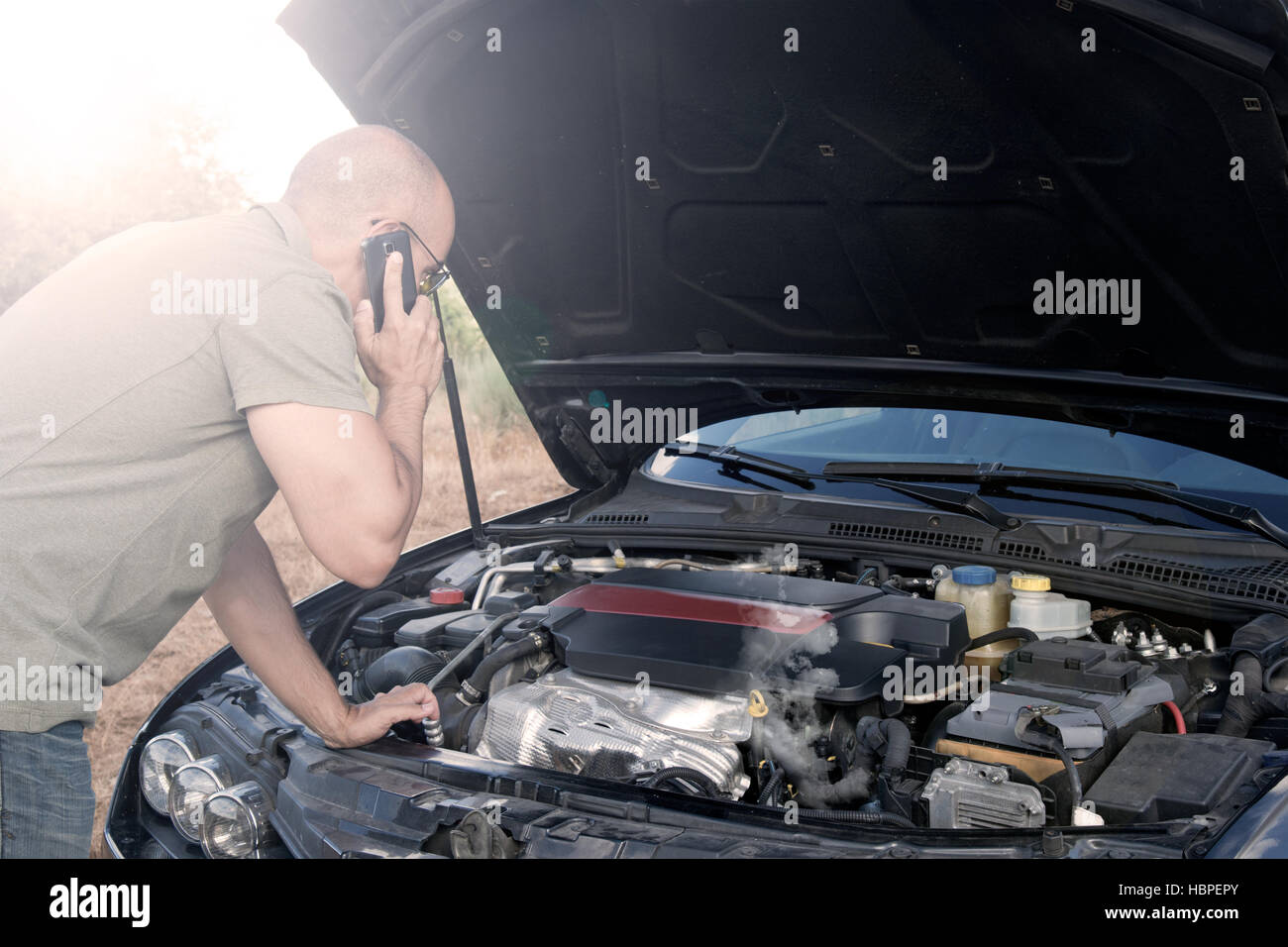 Broken down car smoke hi-res stock photography and images - Alamy