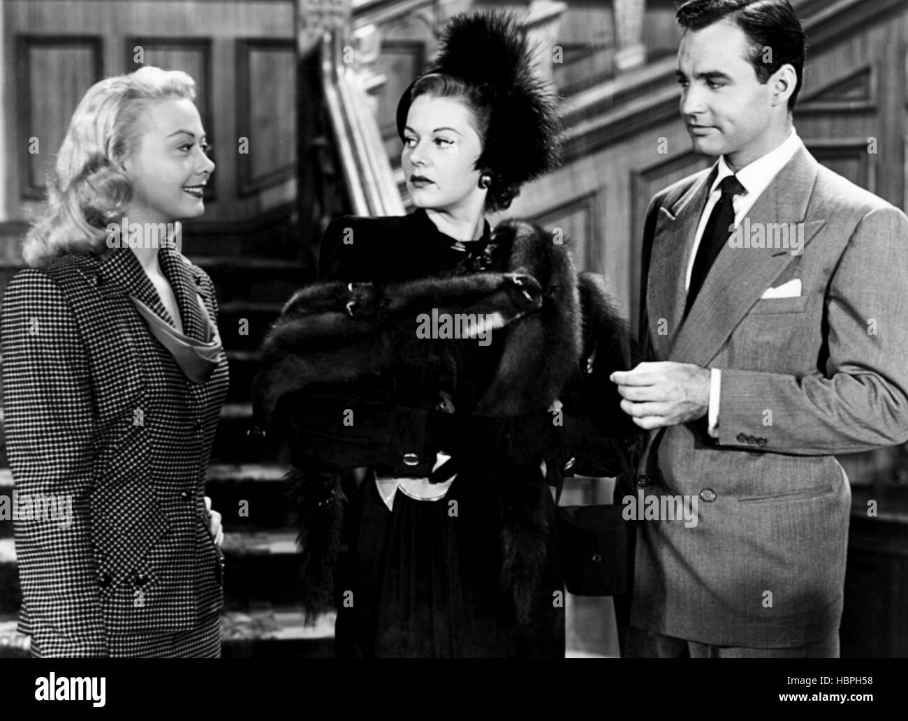 EXPOSED, from left, Adele Mara, Adrian Booth, (aka Lorna Gray), Mark Roberts, 1947 Stock Photo ...