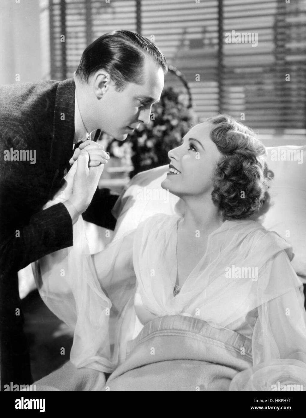 EXCLUSIVE STORY, l-r: Franchot Tone, Madge Evans, 1936 Stock Photo - Alamy