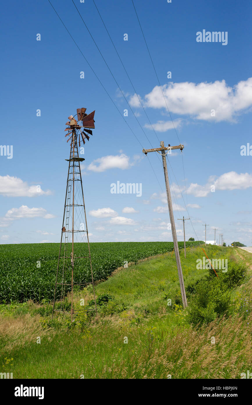 Windmill and telegraph poles in rural Madison County, Iowa, USA Stock ...