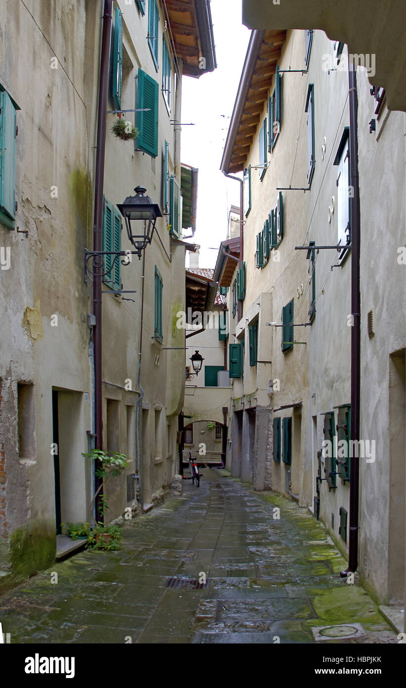 narrow alley at an old town Stock Photo - Alamy