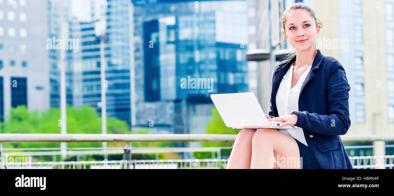dynamic young executive girl working outside Stock Photo - Alamy