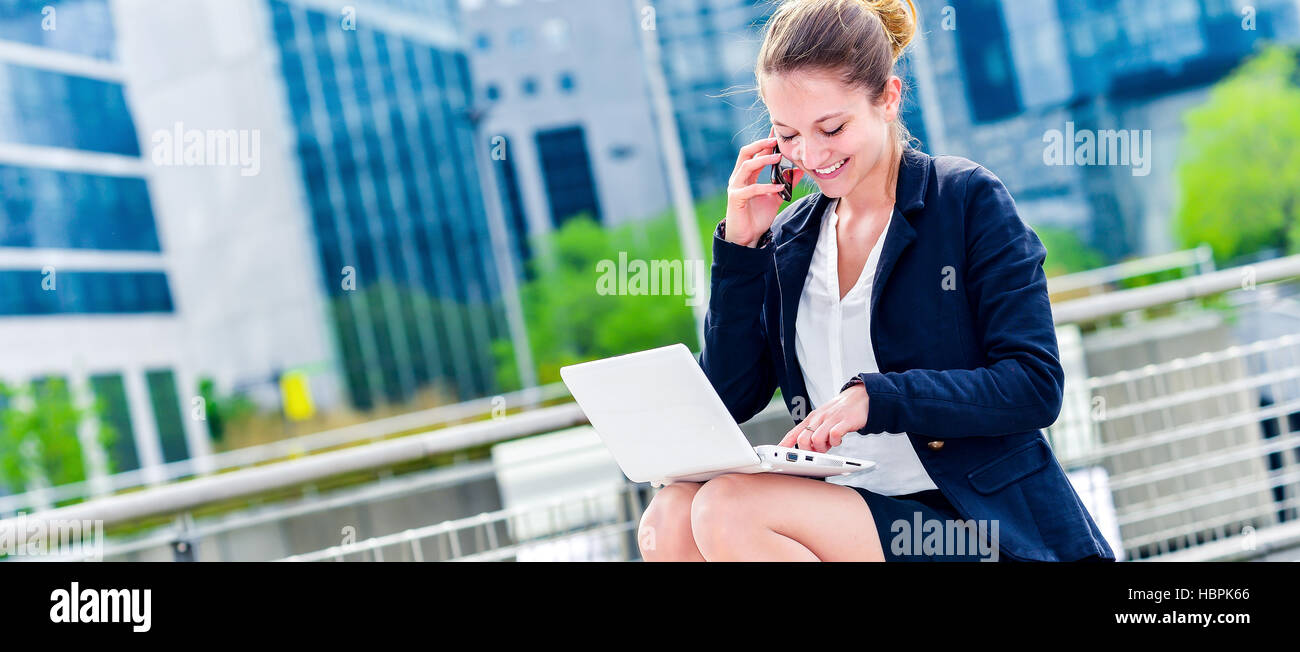 dynamic young executive working outside Stock Photo - Alamy