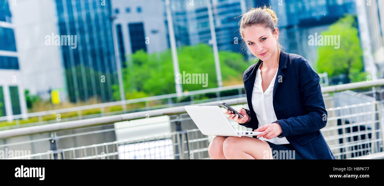 dynamic young executive working outside Stock Photo - Alamy