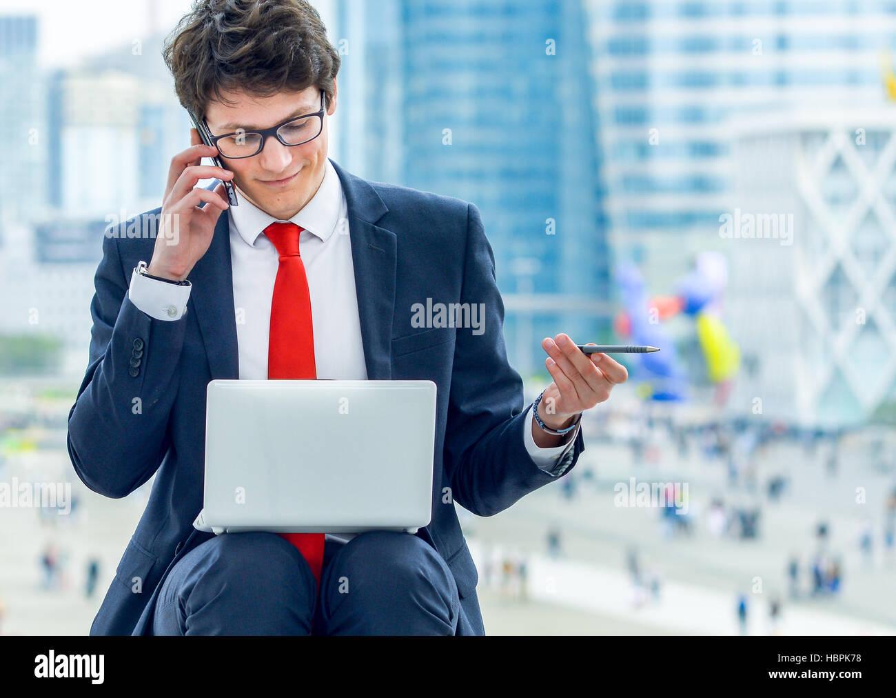 dynamic young executive working outside Stock Photo - Alamy