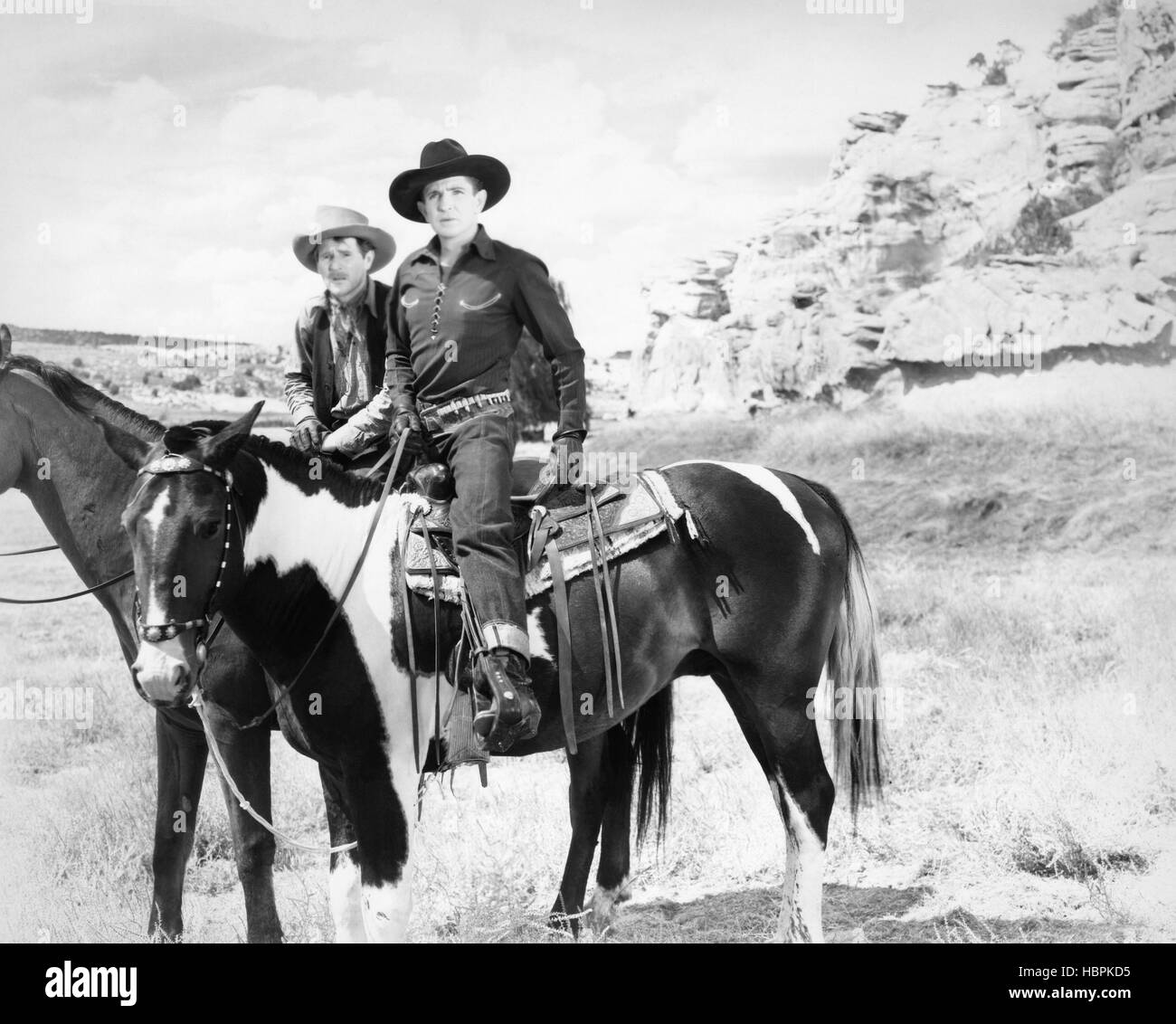 FEUD OF THE RANGE, from left: Budd Buster, Bob Steele, 1939 Stock Photo ...