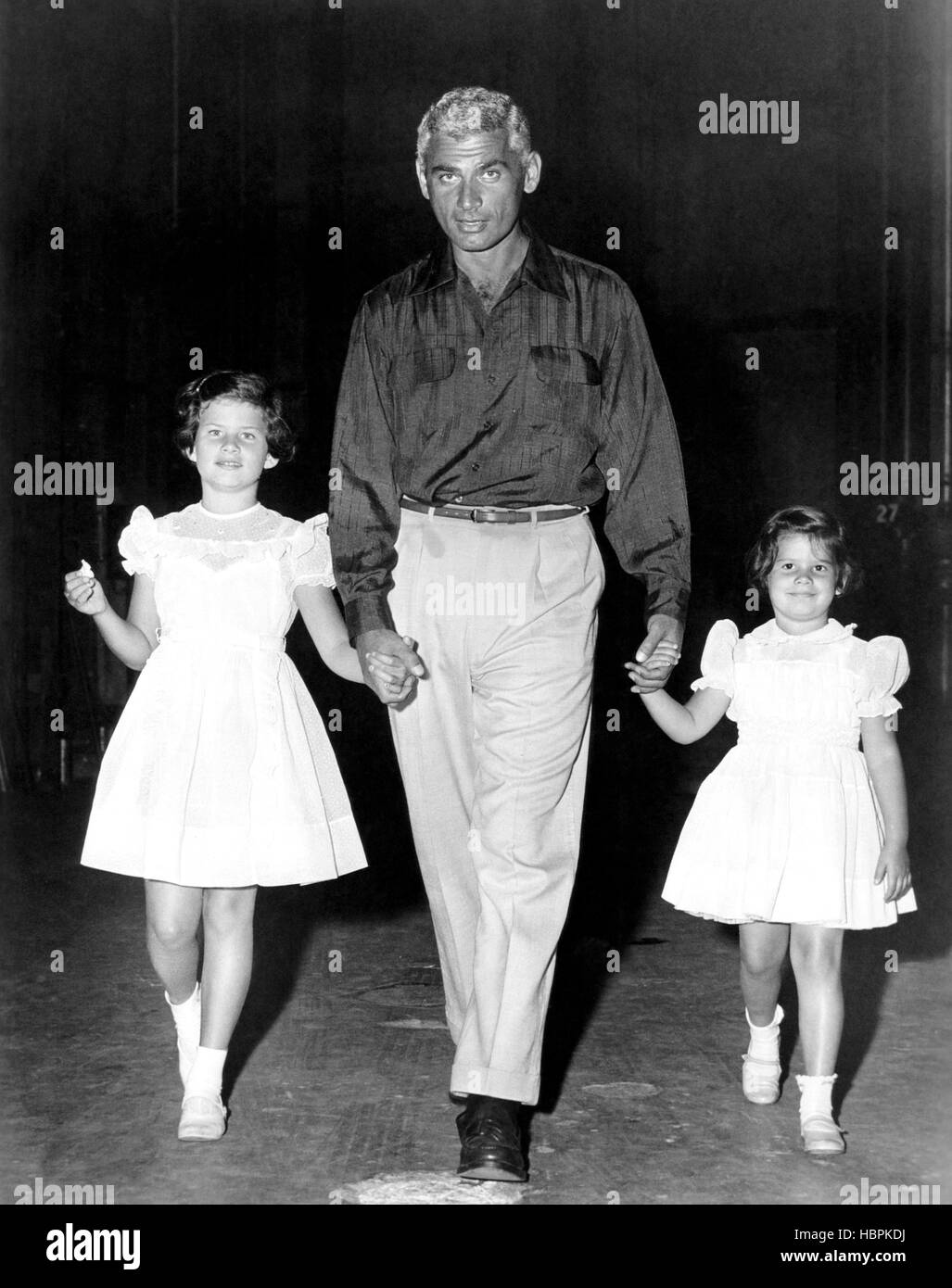 FEMALE ON THE BEACH, from left: Jamie Chandler with father, Jeff ...