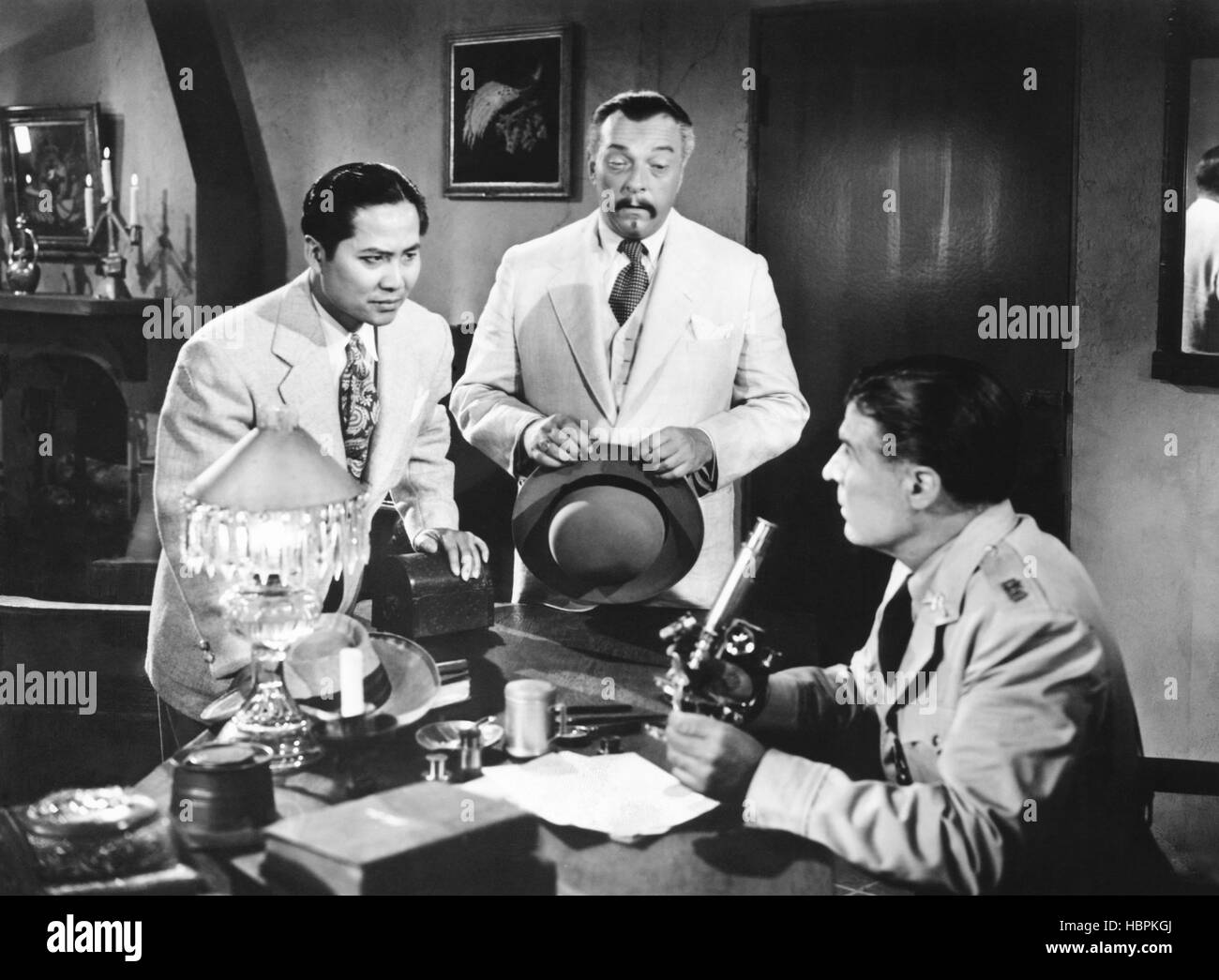 THE FEATHERED SERPENT, standing from left: Keye Luke, Roland Winters as ...
