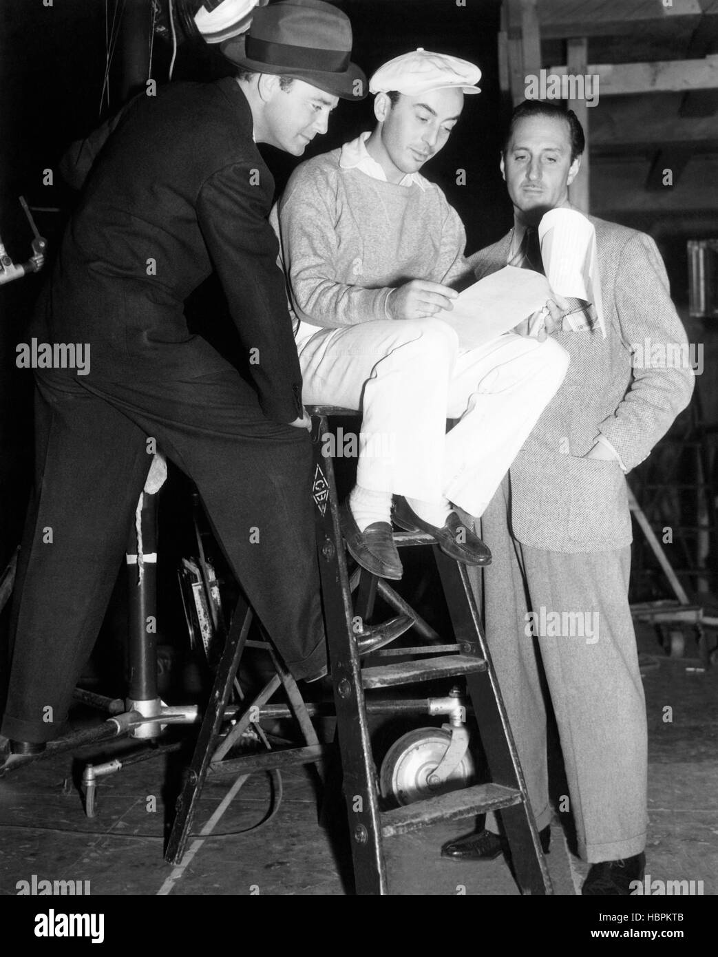 FINGERS AT THE WINDOW, from left, Lew Ayres, director Charles Lederer ...