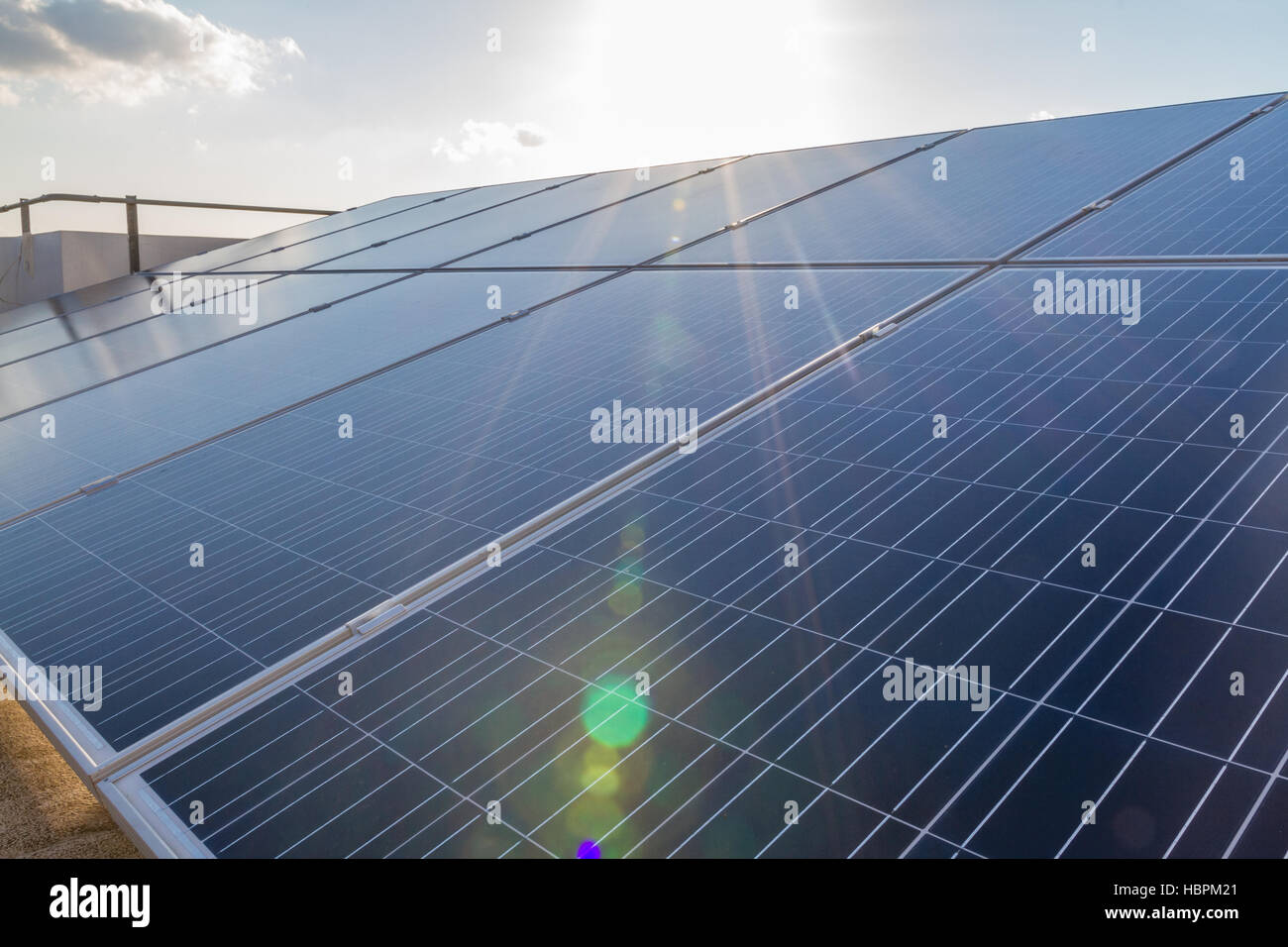 Photovoltaic solar panels with deliberate lens flare Stock Photo - Alamy