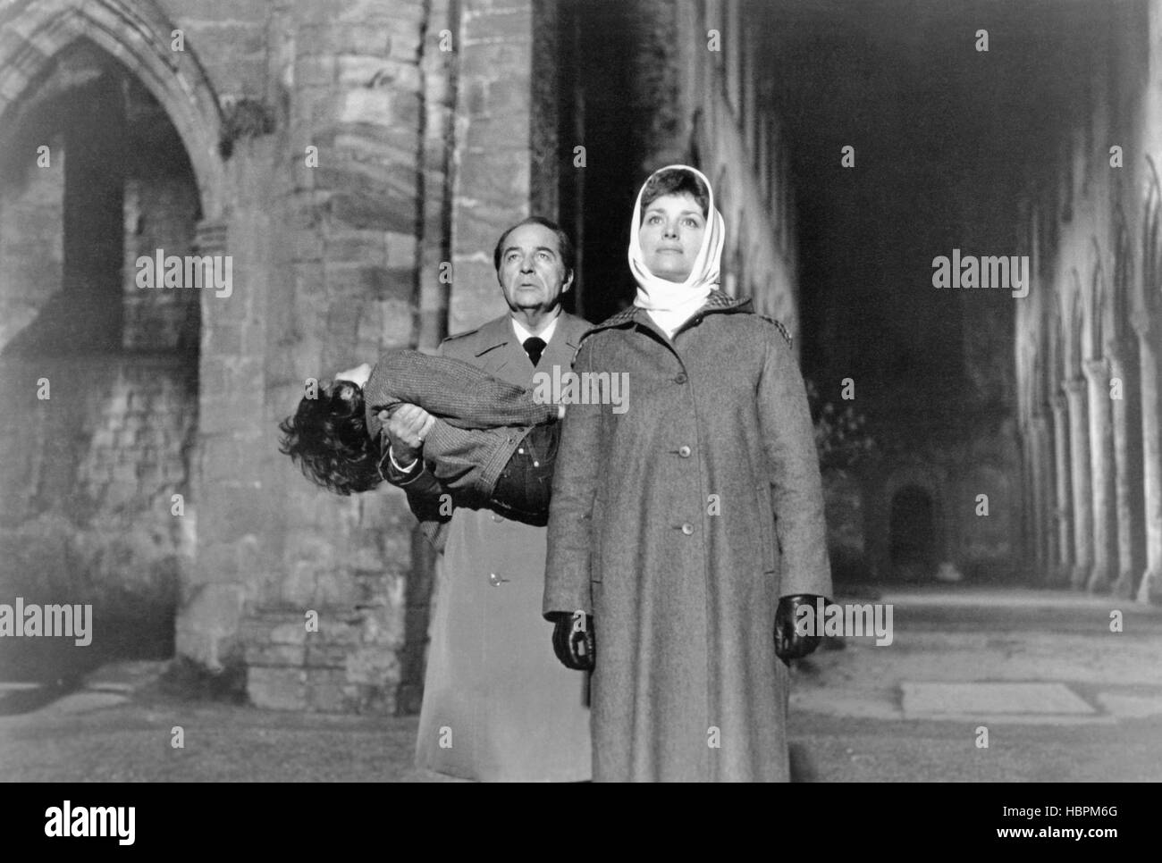 THE FINAL CONFLICT, from left, Rossano Brazzi, (carrying Barnaby Holm ...