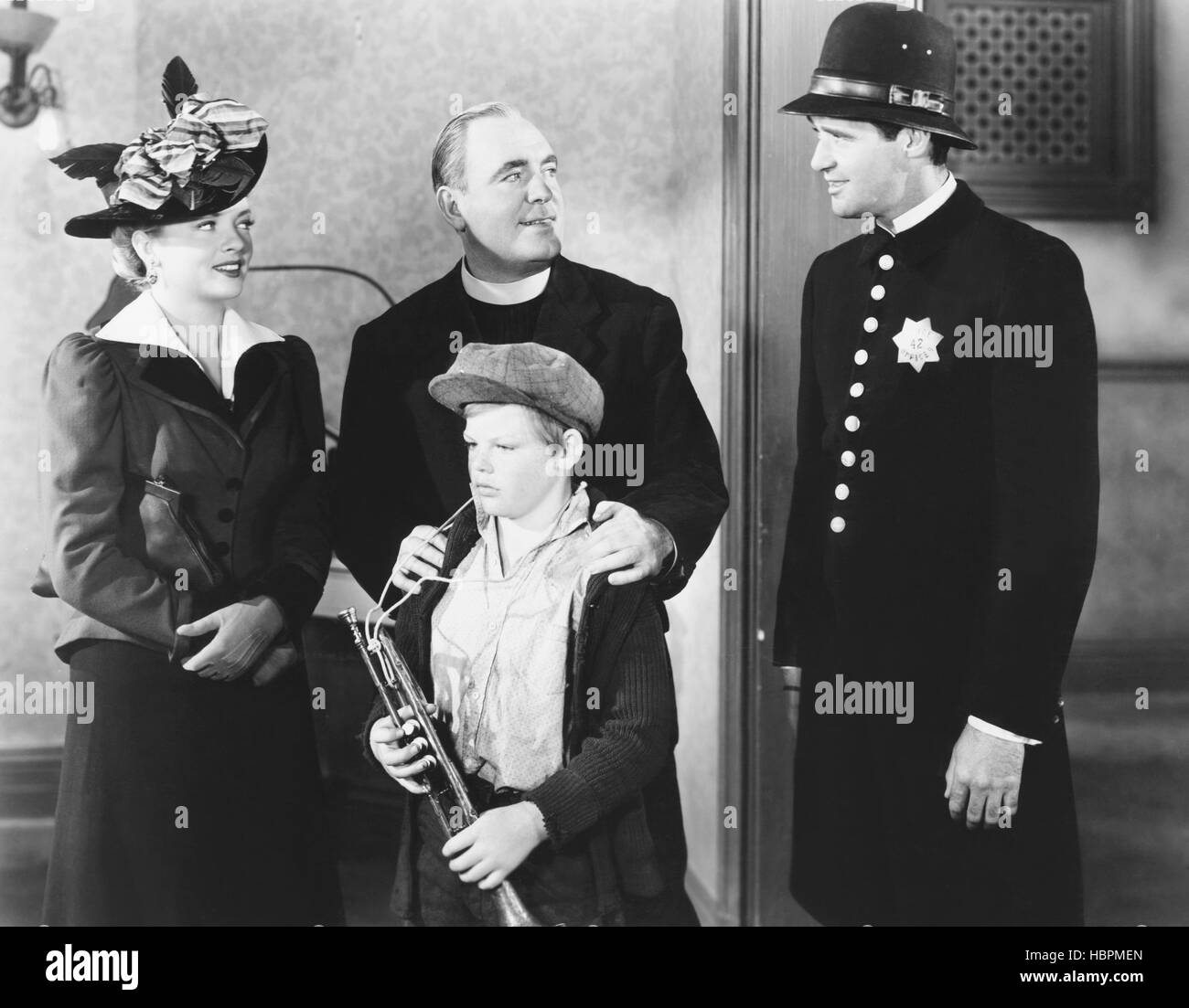 FIGHTING FATHER DUNNE, adults from left: Myrna Dell, Pat O'Brien, James ...