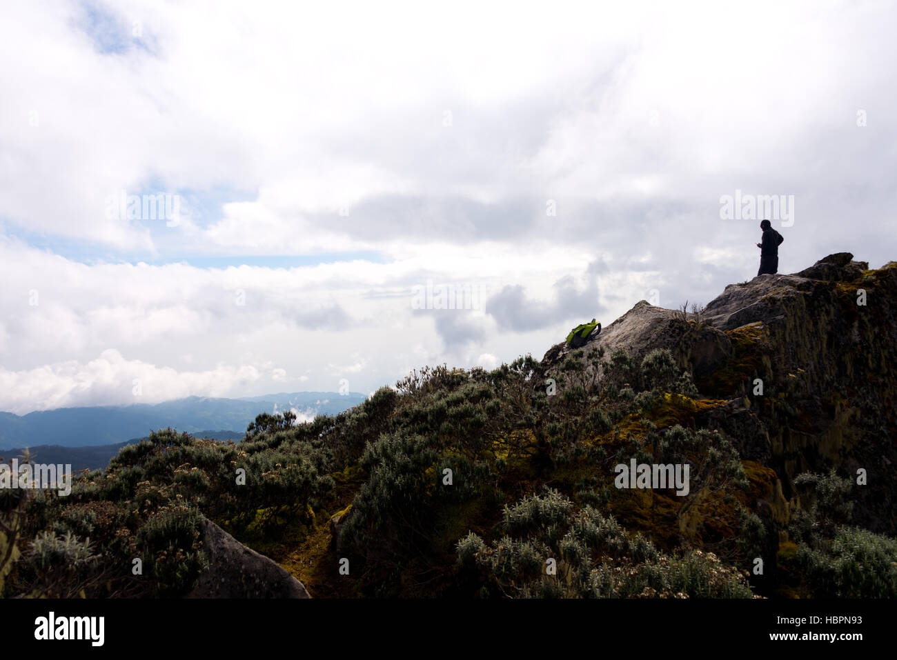 single person on summit Stock Photo - Alamy