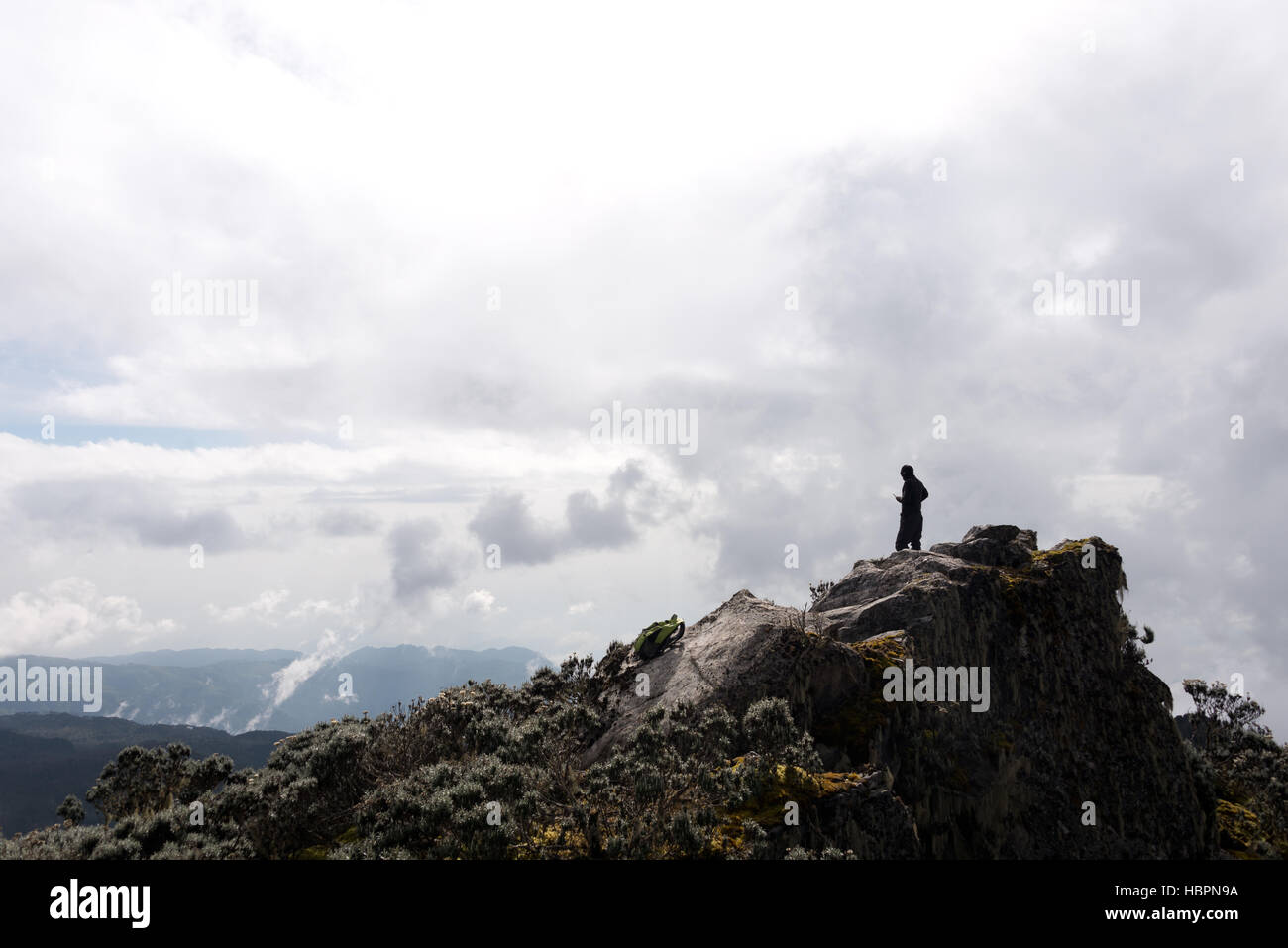 single person on summit Stock Photo - Alamy