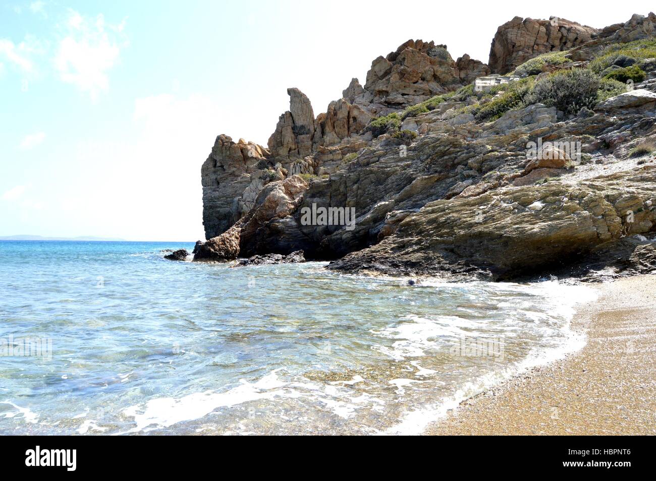 A beach in Crete with rocks and pebbles Stock Photo - Alamy