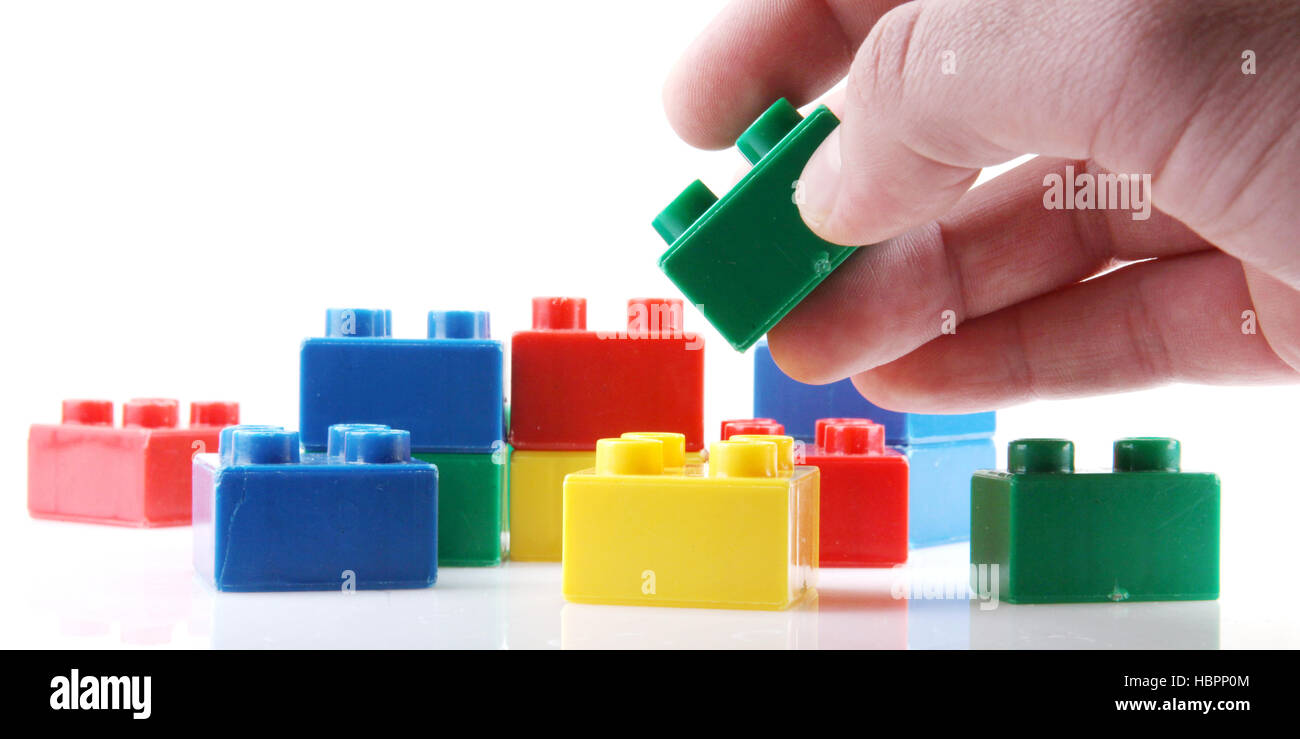 Plastic building block Stock Photo - Alamy