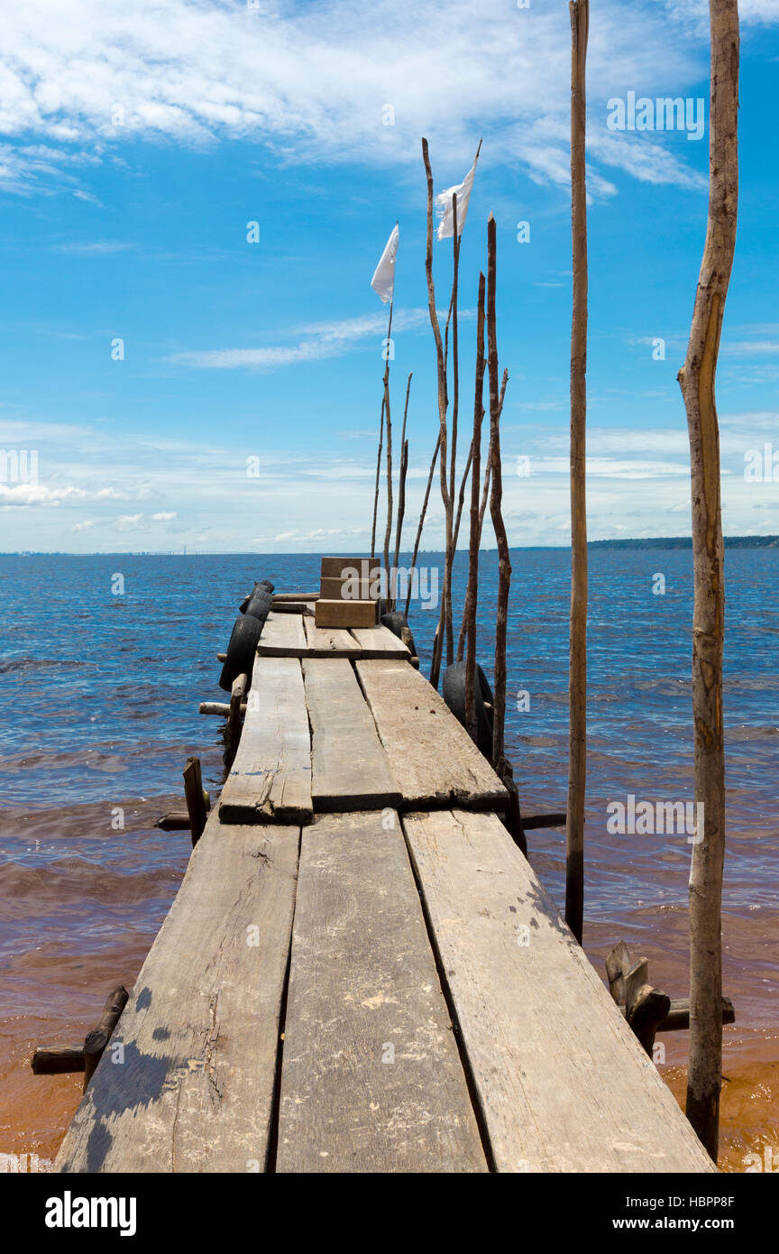 Wooden pier and sand beach on the Amazon River in Manaus, Brazil Stock ...