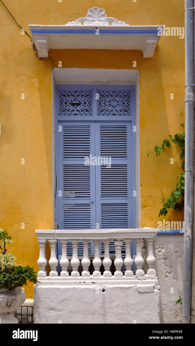 Old colonial balcony in a historic yellow building in Cartagena ...