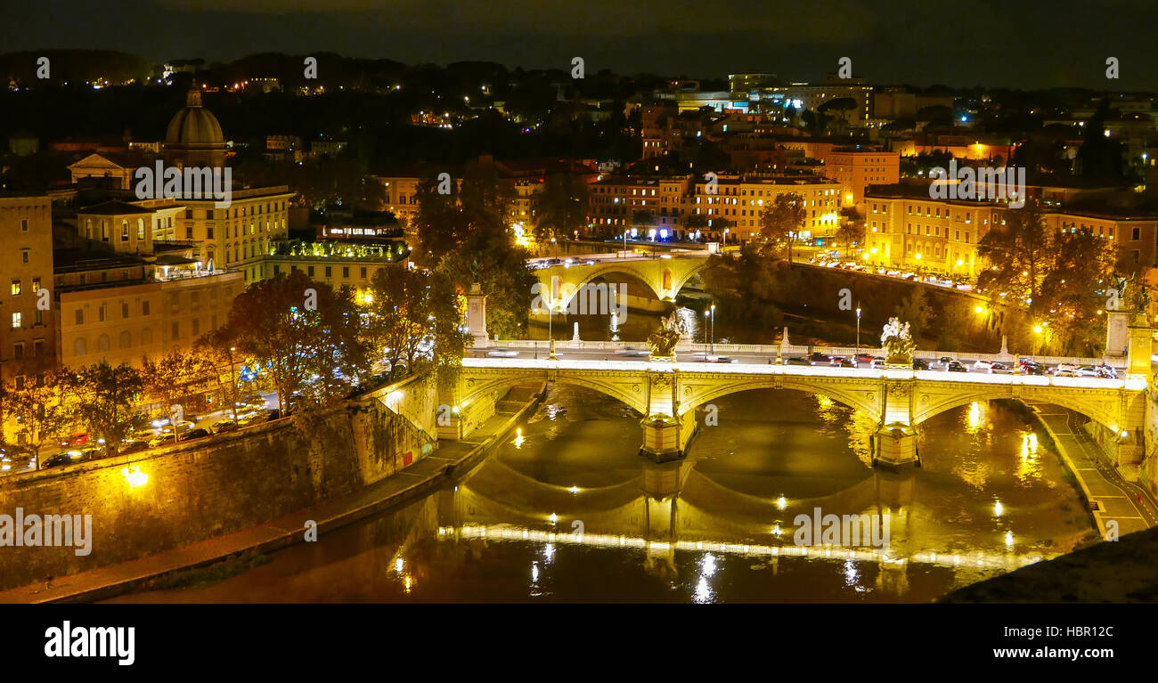 The bridges over River Tiber in Rome - amazing night view Stock Photo ...